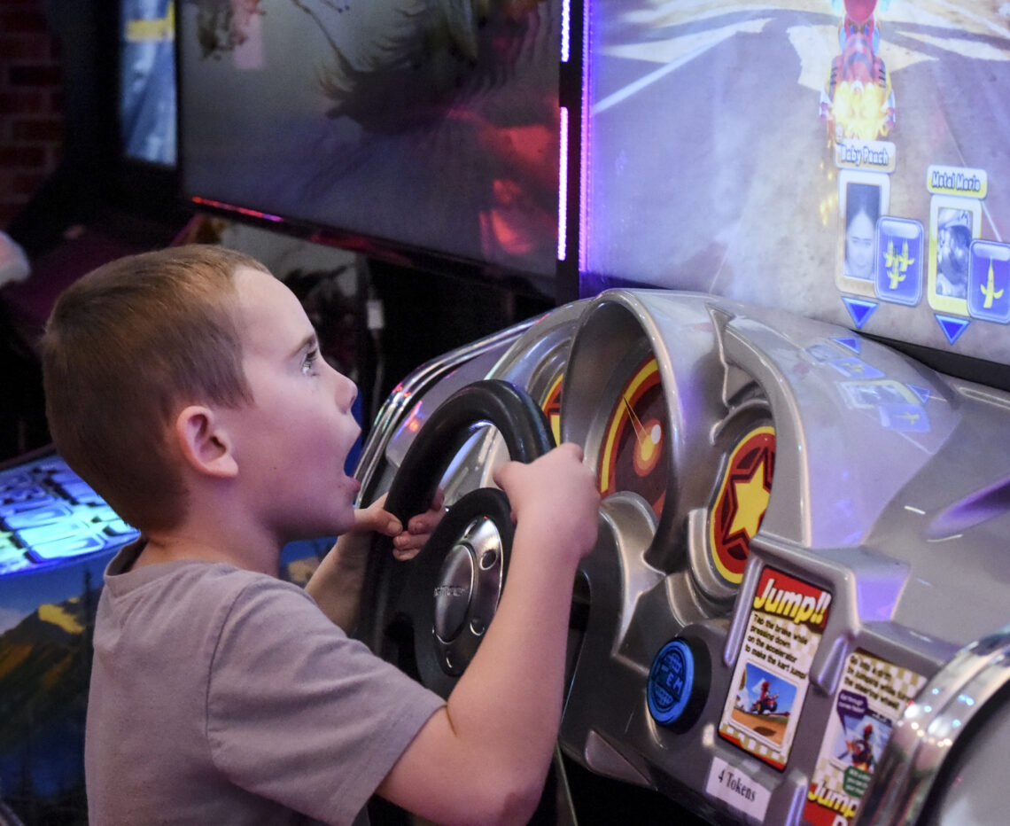Parents, kids play together at Family Fun Day at Starport Arcade - The ...