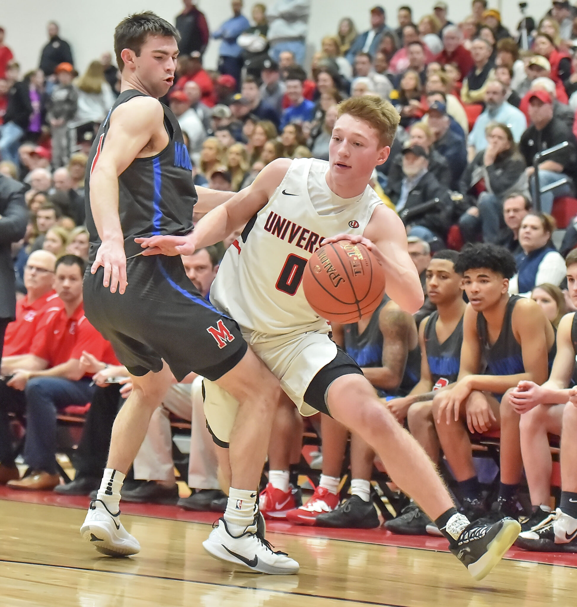 University guard K.J. McClurg commits to New Hampshire after a topsy ...