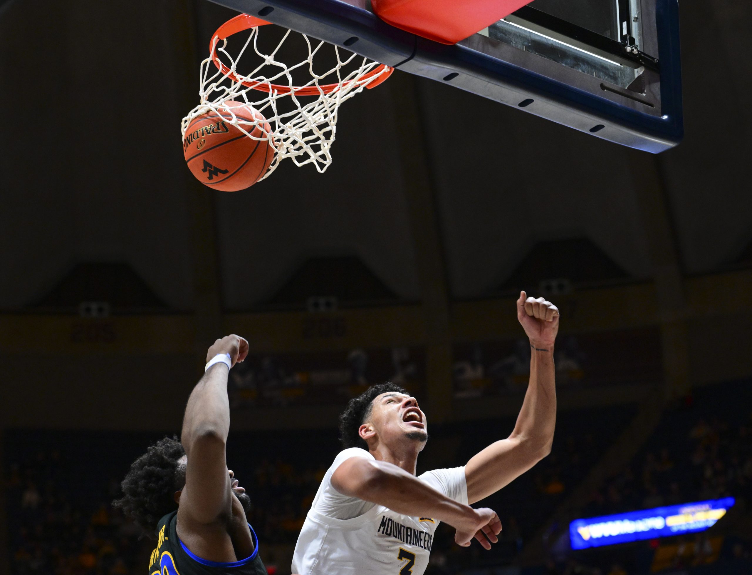 Tre Mitchell makes up for lost time, WVU rolls past Morehead State 75 ...