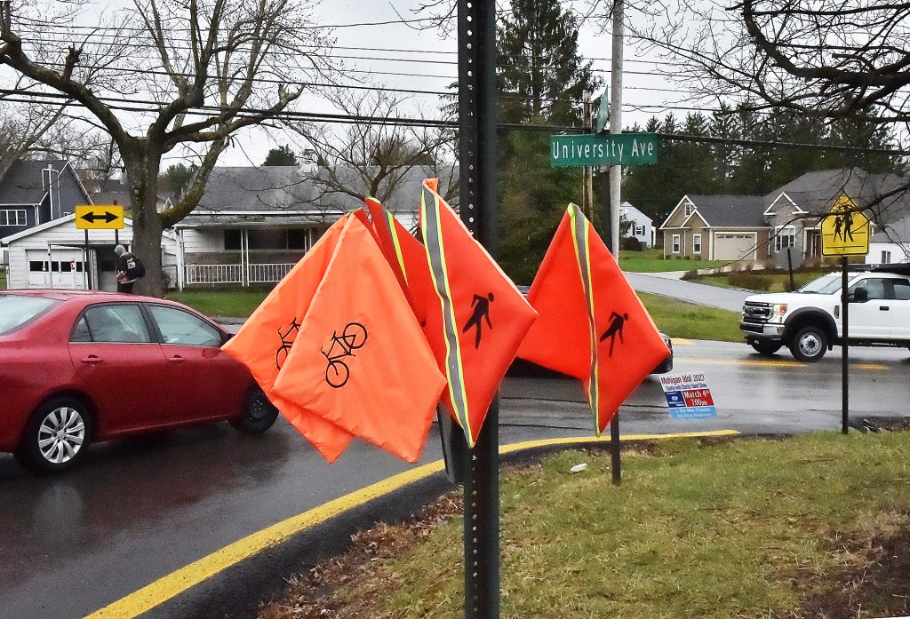 Pedestrian program has orange flags flying around Suncrest schools ...