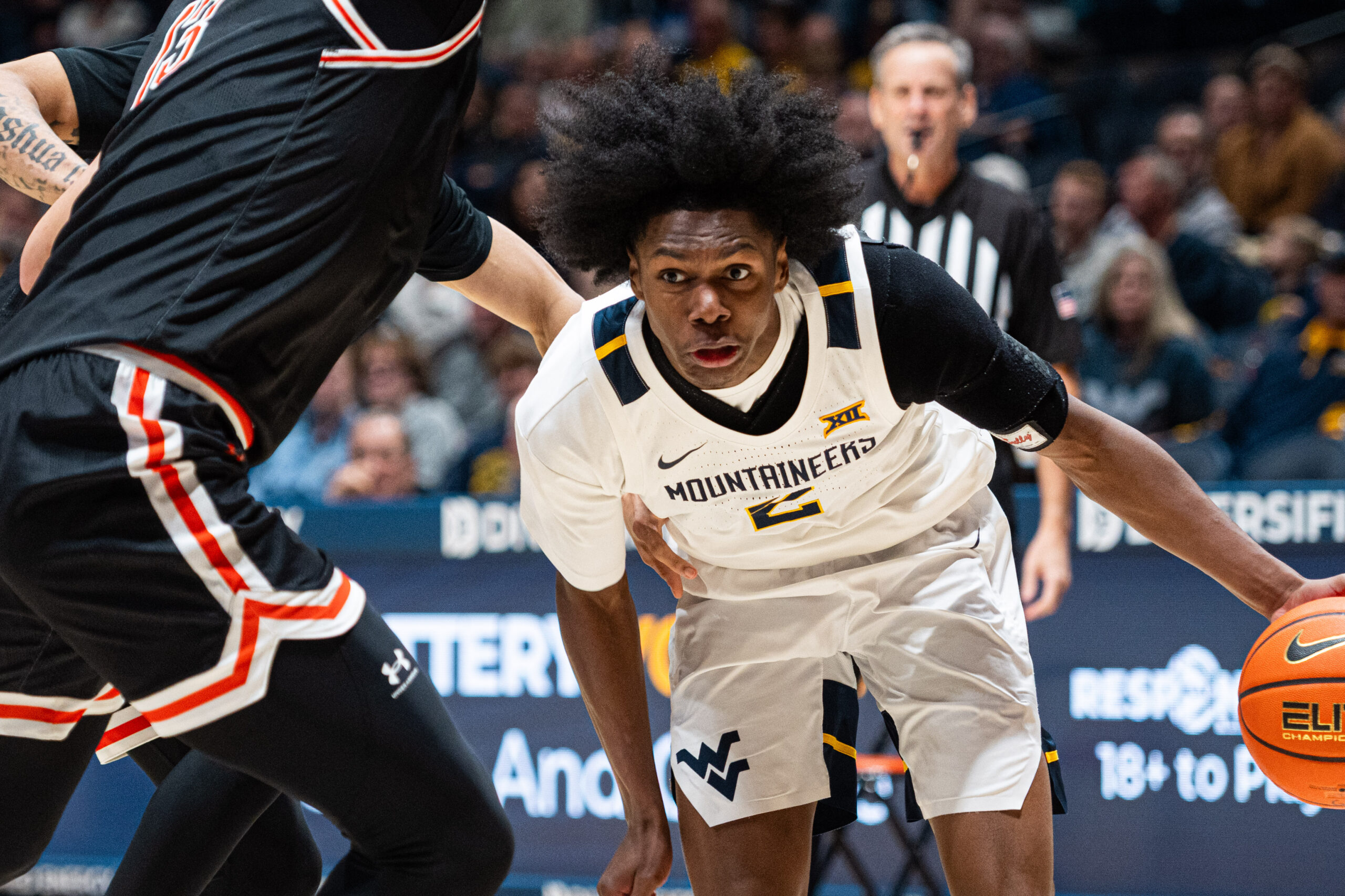 WVU hoops guard Amir Jenkins learning on the fly after enrolling early ...