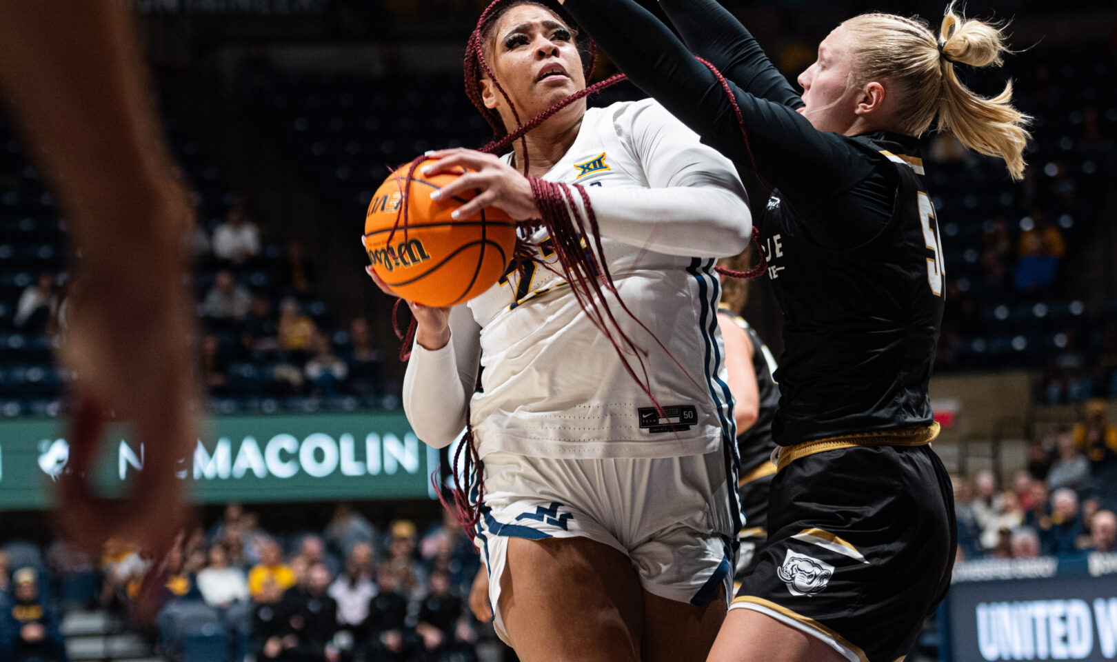 WVU women's hoops team shows off dominant post play to win opener over ...