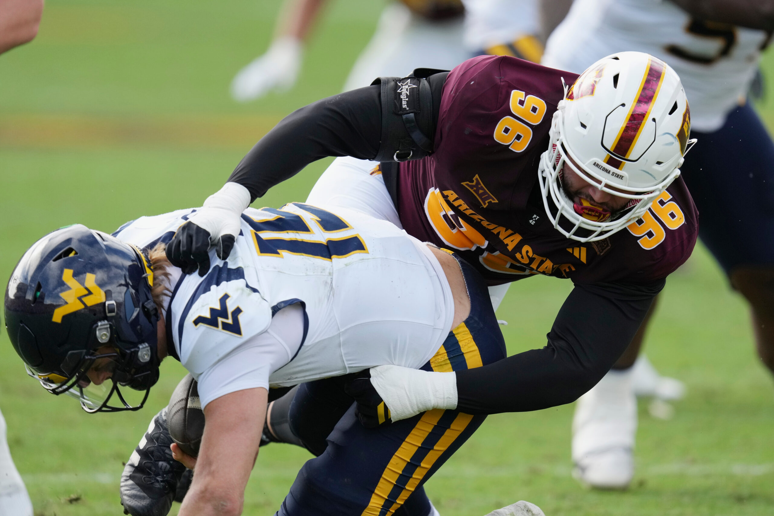 West Virginia comes up short against Arizona State, falling out of bowl ...