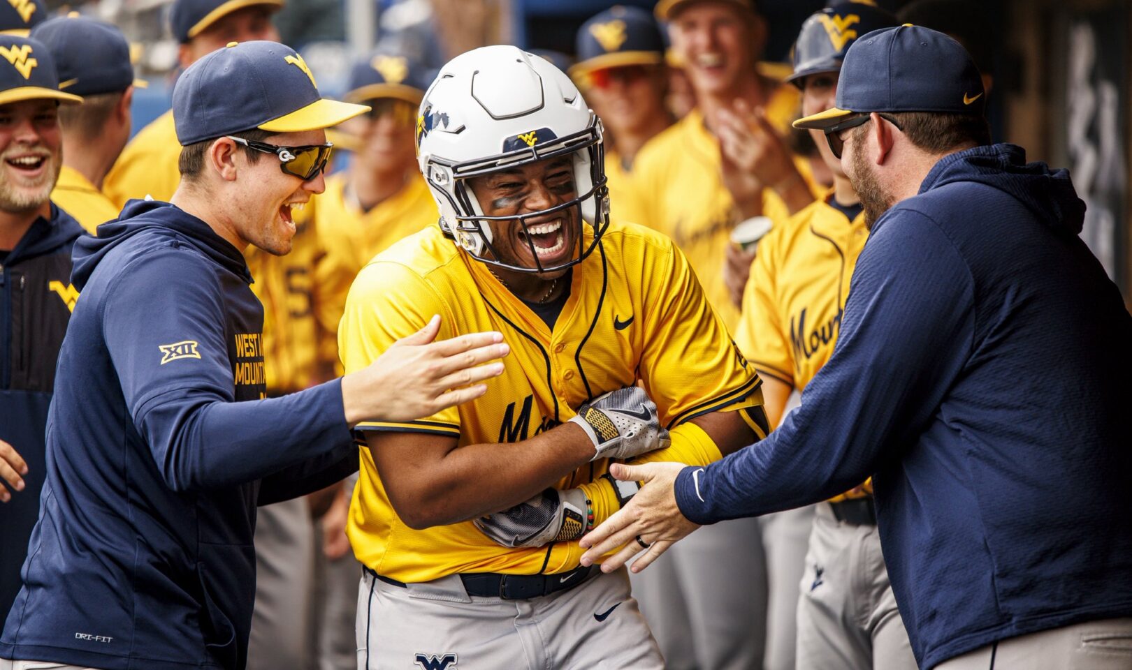 That's a sweep: No. 15 WVU mercy rules No. 7 Kansas, 13-2 - The ...